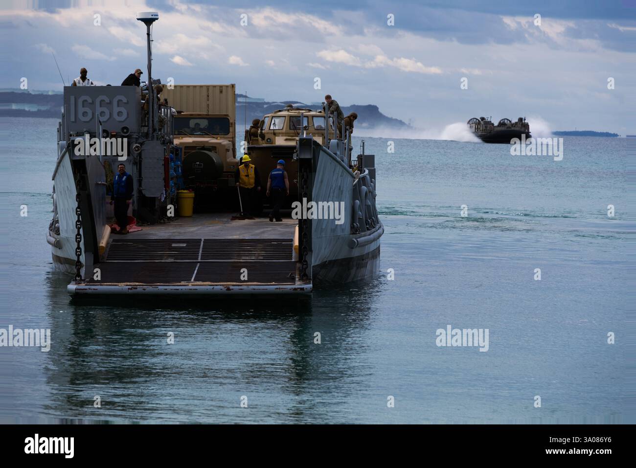 U.S. Navy Sailors with Naval Beach Unit 7, 31st Marine Expeditionary ...