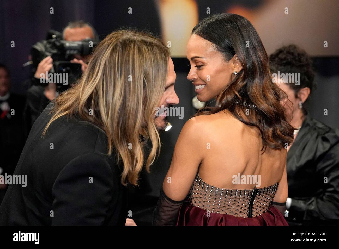 Marco Perego-Saldana, left, and Zoe Saldana, winner of the award for ...
