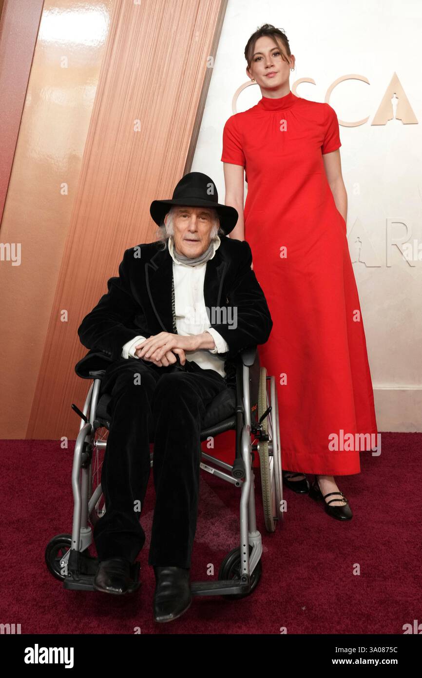 Ed Lachman, left and Bella Lachman arrive at the Oscars on Sunday ...