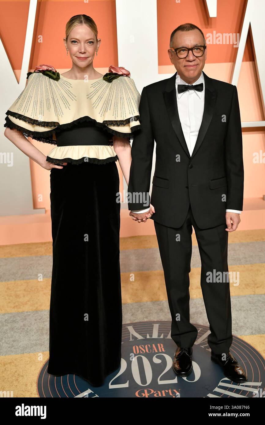 Riki Lindhome, left, and Fred Armisen arrive at the Vanity Fair Oscar ...