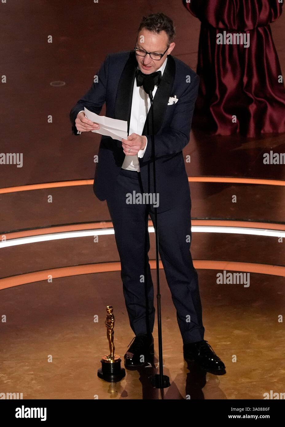 Lol Crawley accepts the award for best cinematography for "The Brutalist" during the Oscars on ...