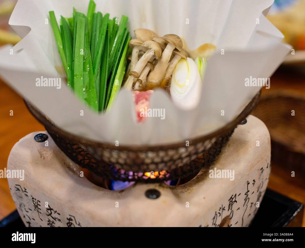Dinner is served at Musouen, a hot spring inn in the southern part of ...