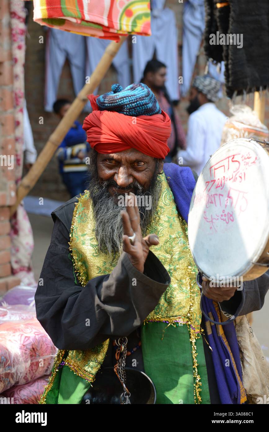 Portrait of a Sufi faqeer attending the annual 'Urs (death anniversary ...