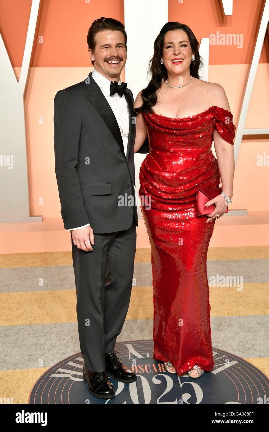 Jason Ritter, left, and Melanie Lynskey arrive at the Vanity Fair Oscar ...