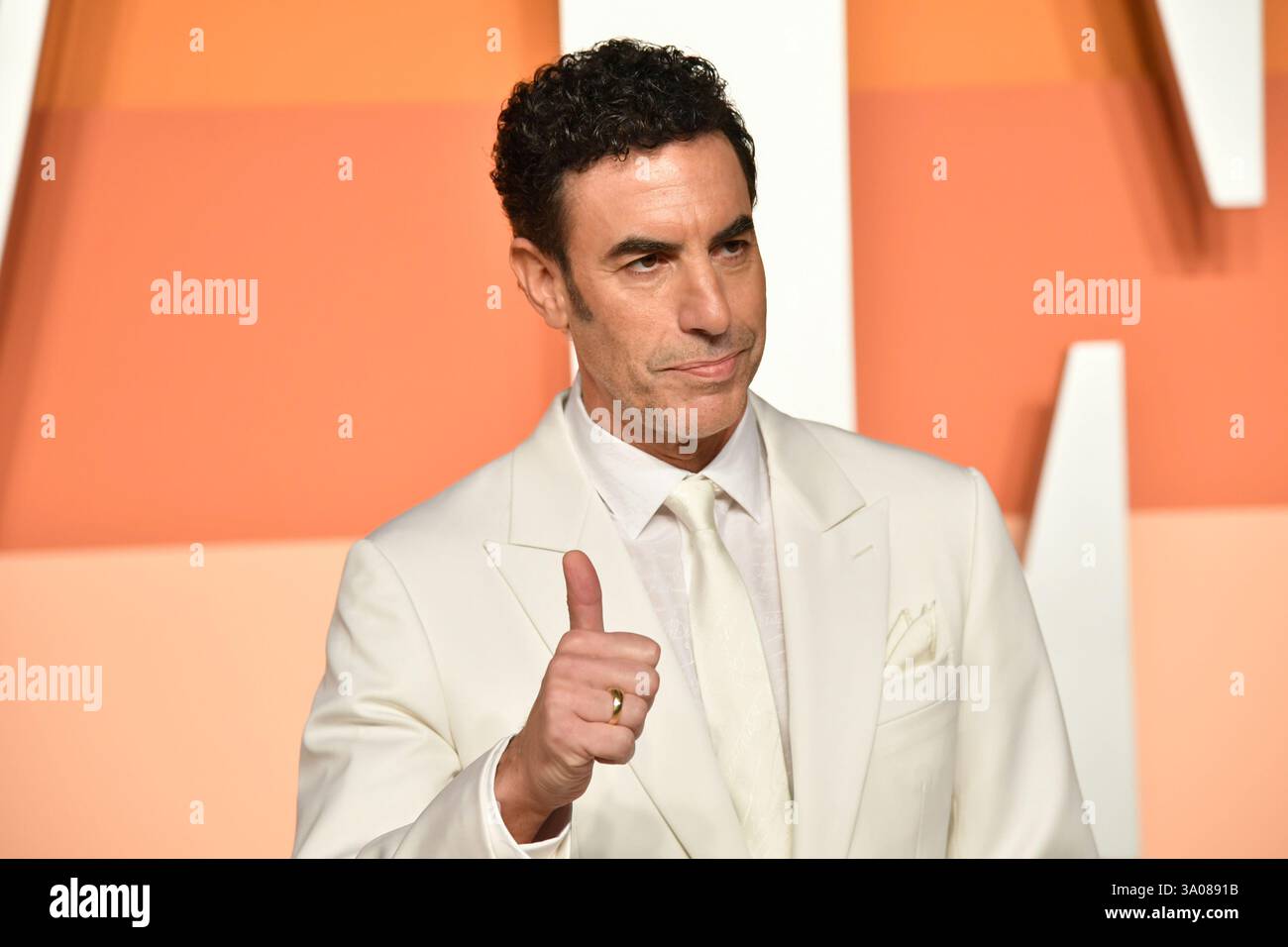 Sacha Baron Cohen arrives at the Vanity Fair Oscar Party on Sunday ...