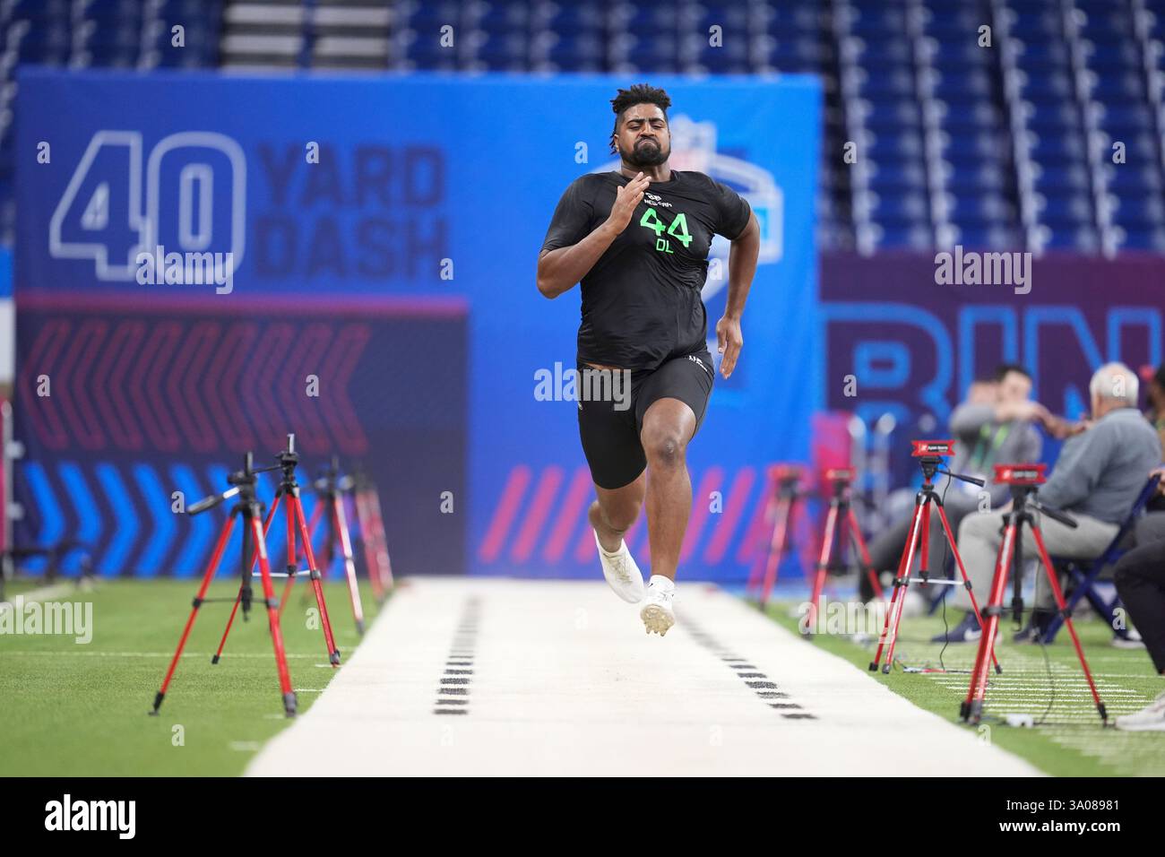Georgia offensive lineman Xavier Truss runs a drill at the NFL football ...