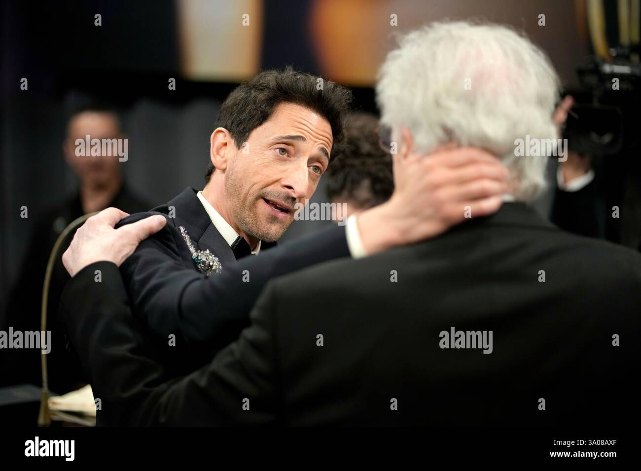 Adrien Brody, left, winner of the award for best performance by an actor in a leading role for ...
