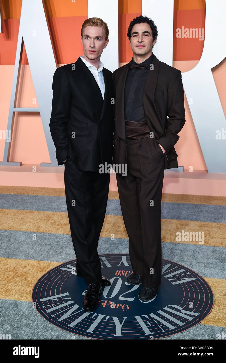 USA. 02nd Mar, 2025. Harrison Ball and Zac Posen walking on the red ...