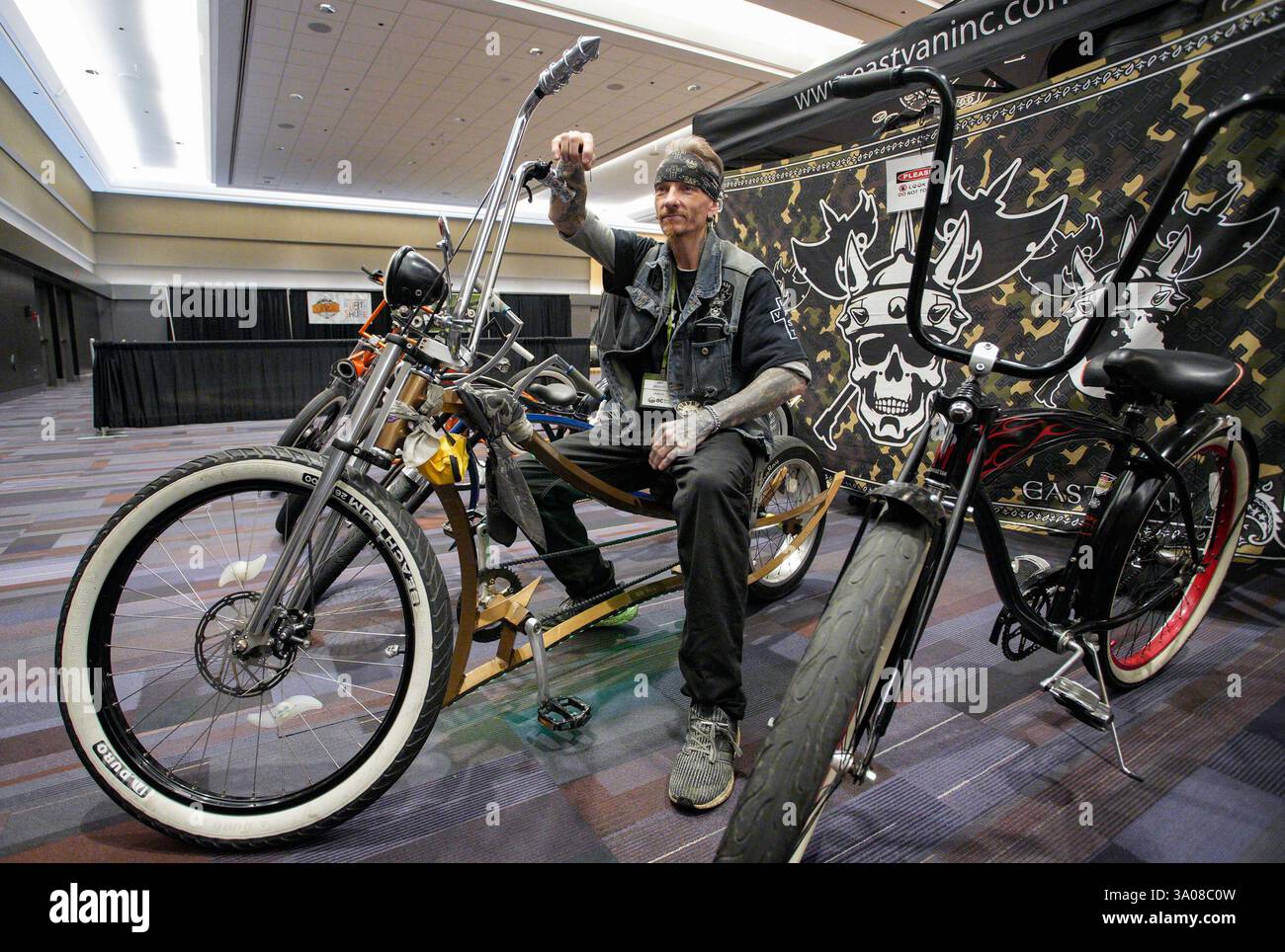 Vancouver, Canada. 2nd Mar, 2025. A bicycle maker poses with his custom ...