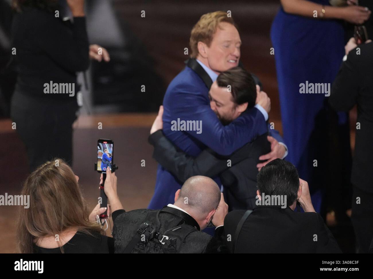 Conan O'Brien, left and Kieran Culkin in the audience during the Oscars ...