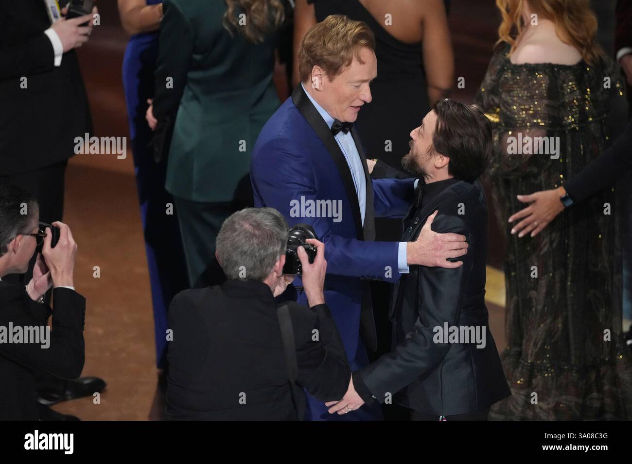 Conan O'Brien, left and Kieran Culkin in the audience during the Oscars ...