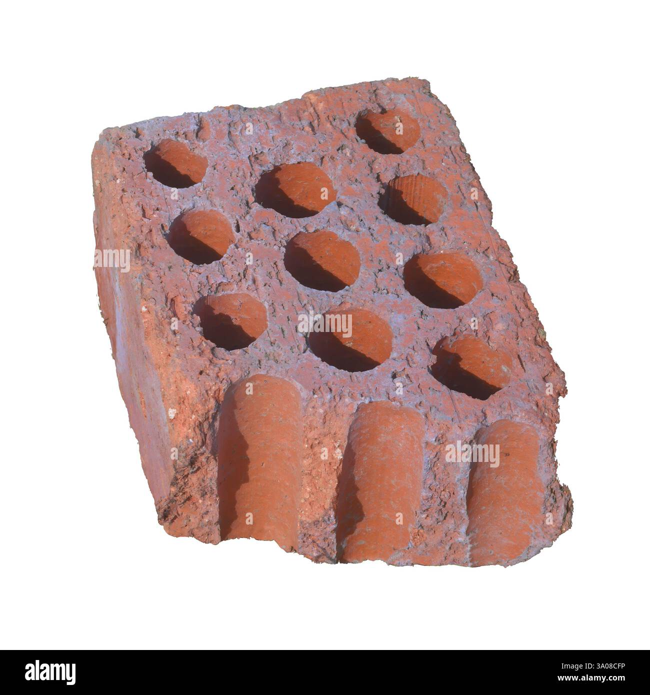 A fragment of red facing perforated brick isolate on a white background ...