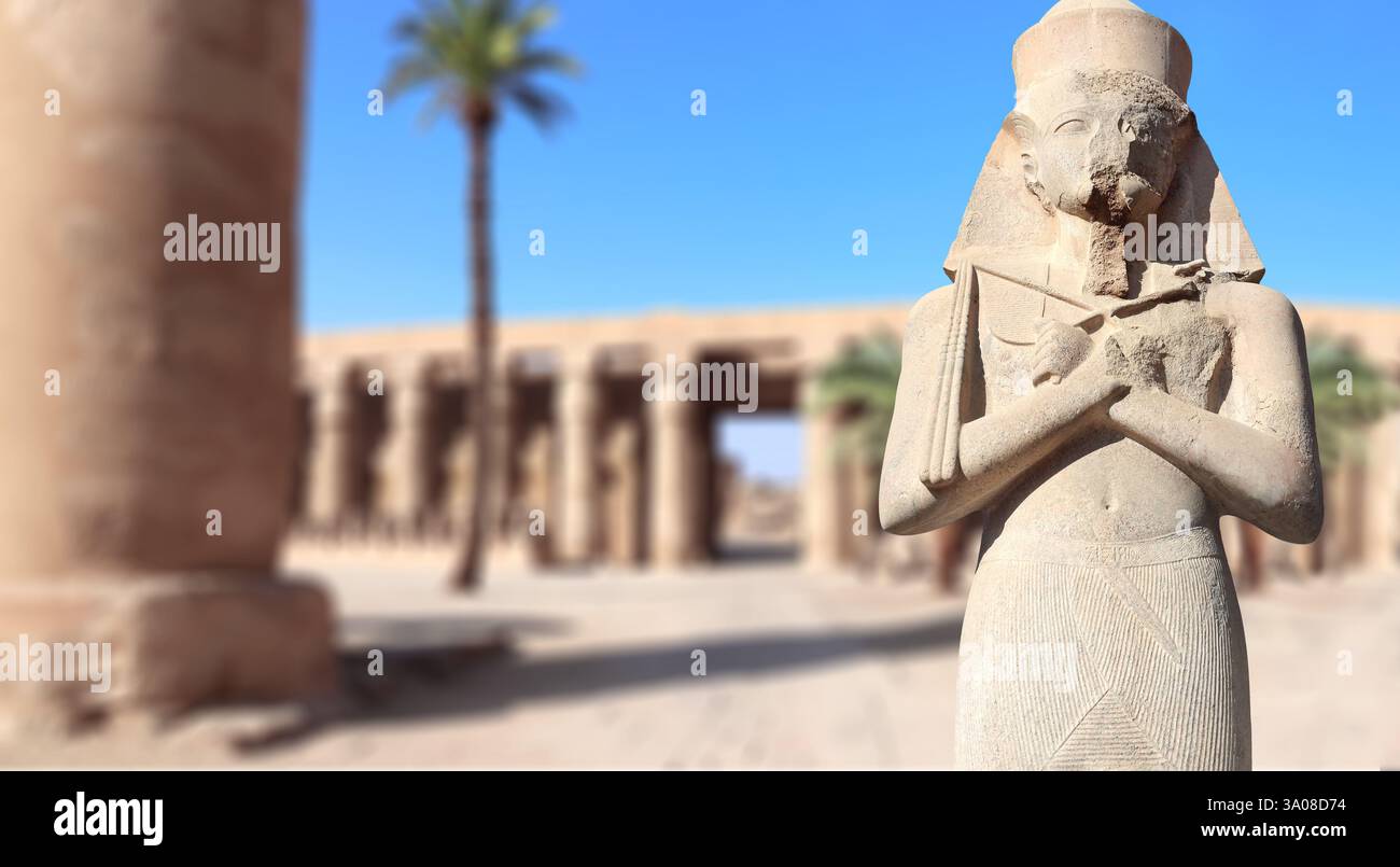 Horizontal banner with pharaoh statue, palm and ancient, Karnak Temple ...