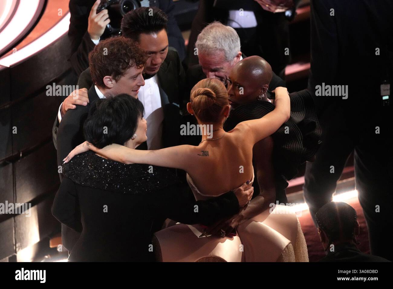 Ethan Slater, from left, Joan Grande, Jon M. Chu, Ariana Grande, Marc ...