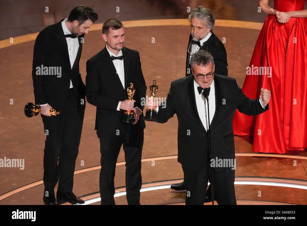 Stephen James, from left, Rhys Salcombe, Gerd Nefzer, and Paul Lambert ...