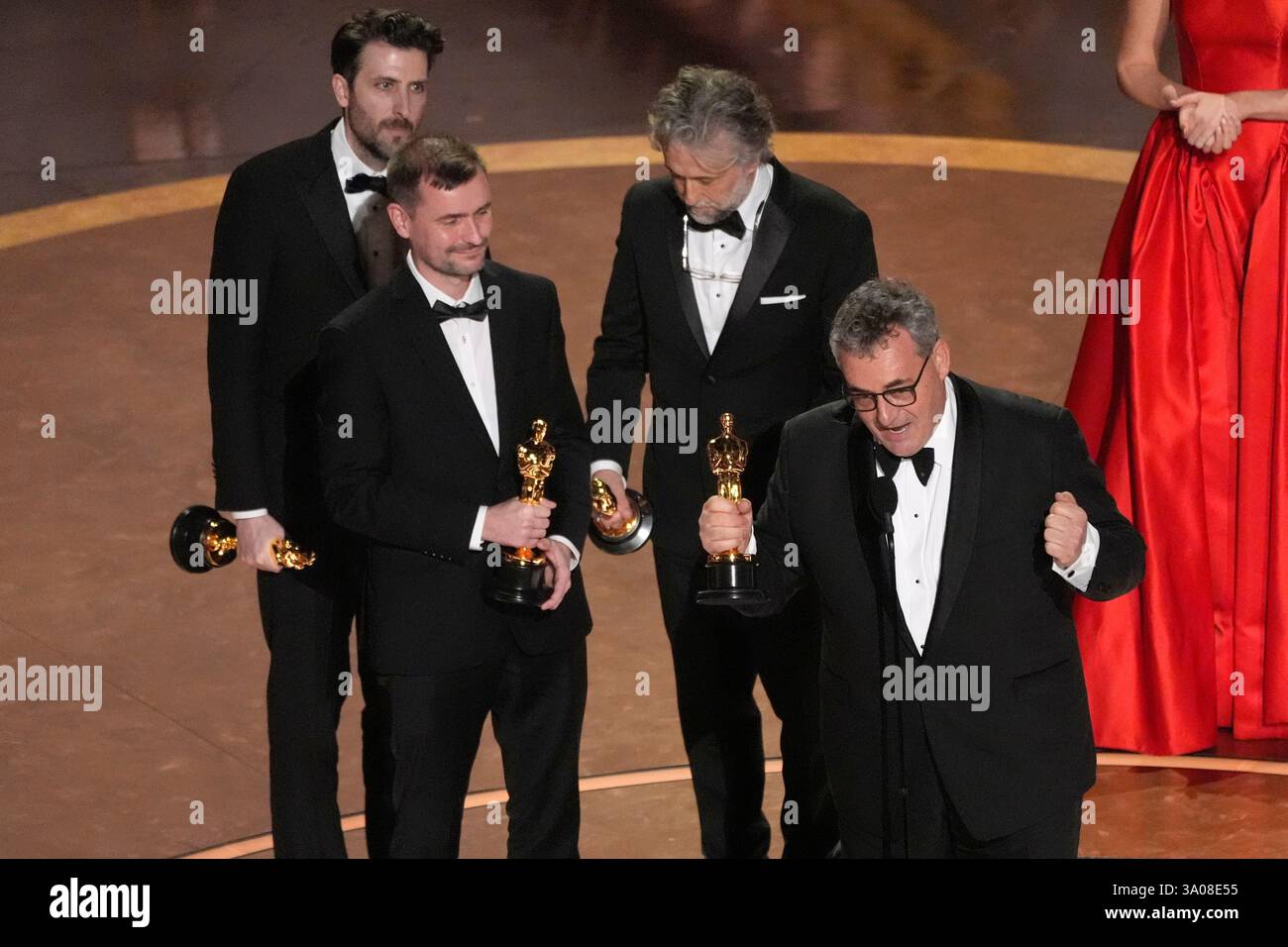 Stephen James, from left, Rhys Salcombe, Gerd Nefzer, and Paul Lambert ...