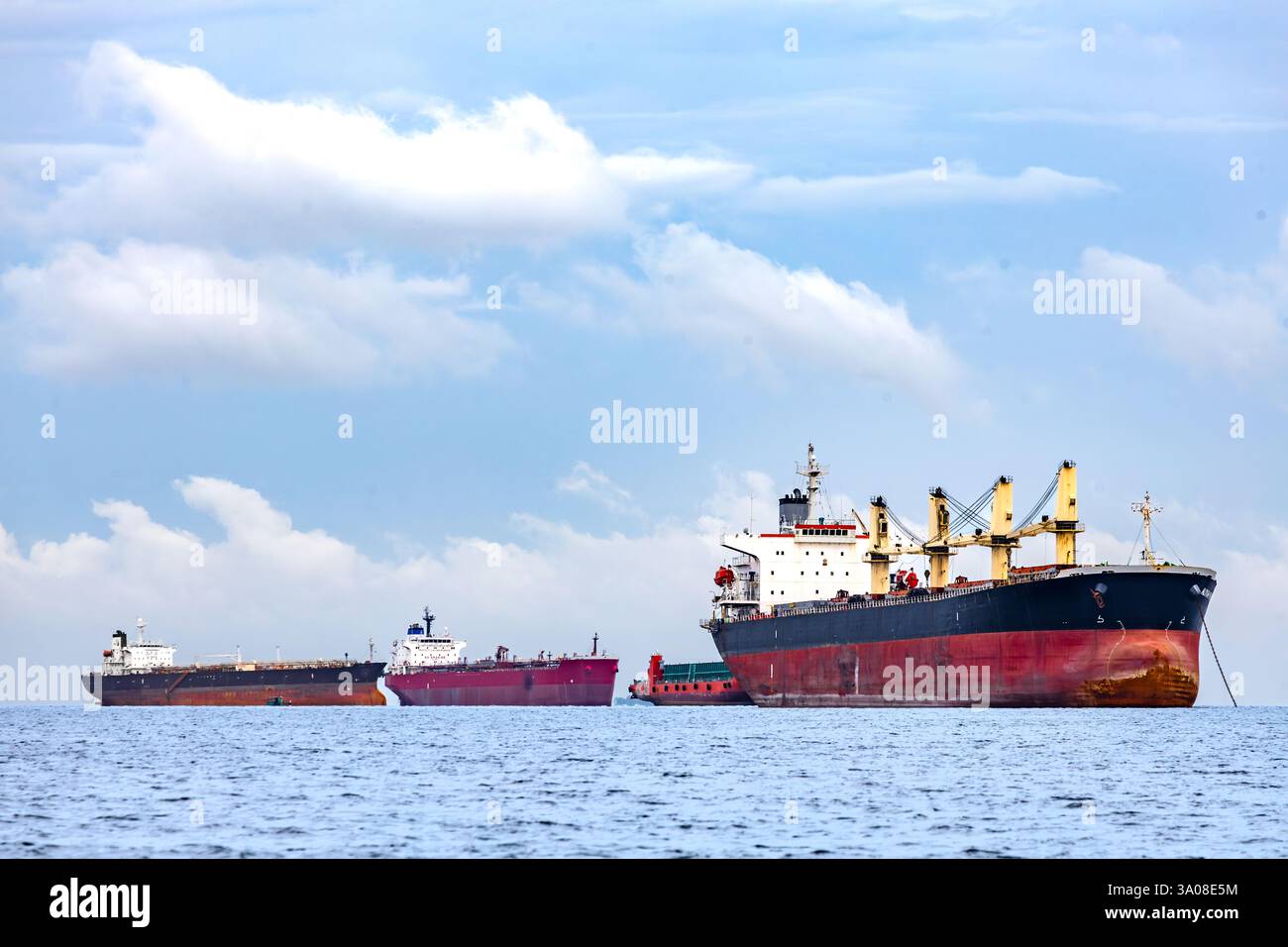 Industrial Ship Operating in Offshore Zone. Large boat under clear blue ...