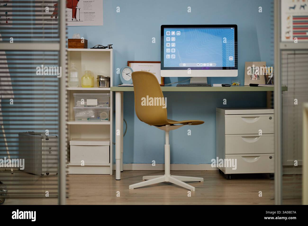 Interior of veterinary doctors office room equipped with computer and ...
