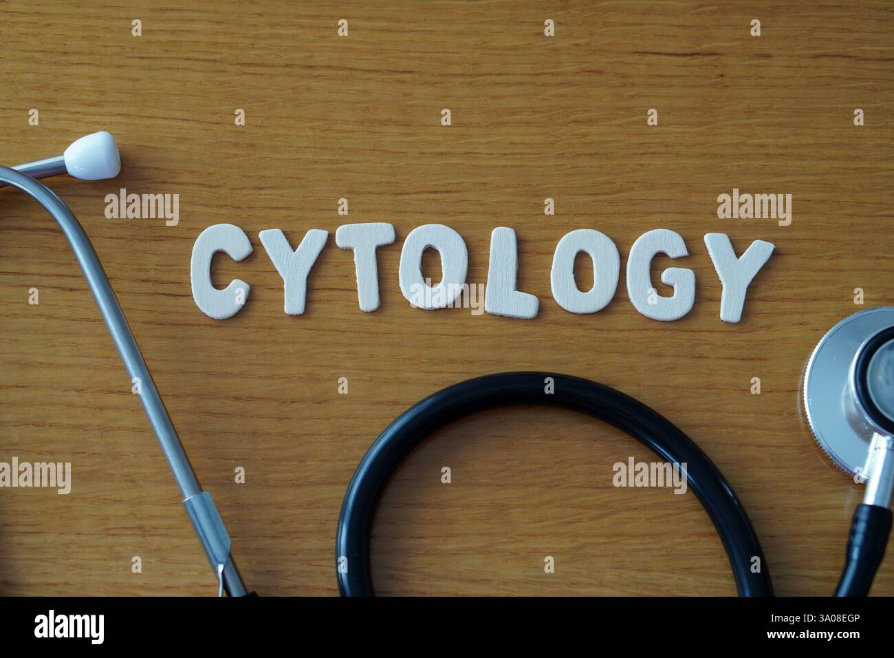 cytology. medical concepts, word written on a wooden table with a ...