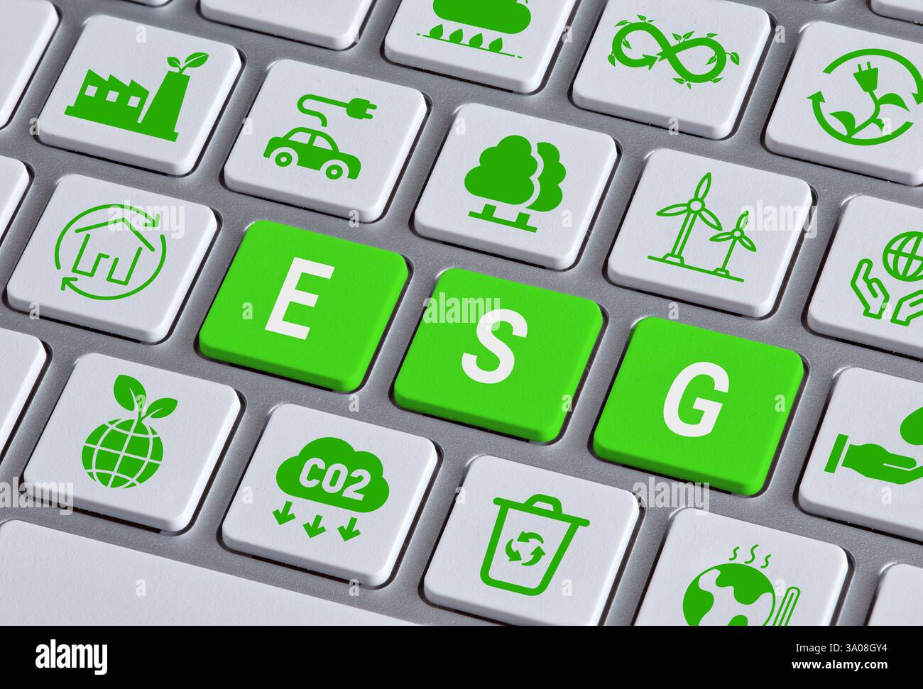 Green keys on keyboard highlight ESG environmental, social, and ...