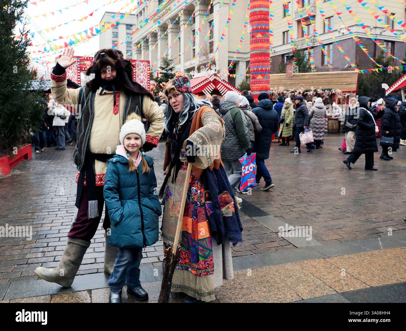 Moscow, Russia.2nd March 2025. A child poses for a photo with folk ...