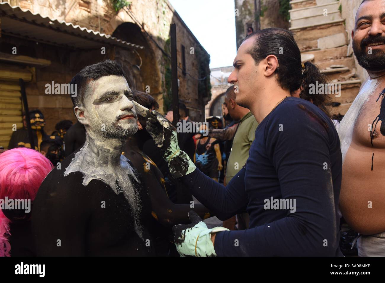 Tripoli, Lebanon. 2nd Mar, 2025. Revellers attend a parade of the traditional Zambo carnival in ...
