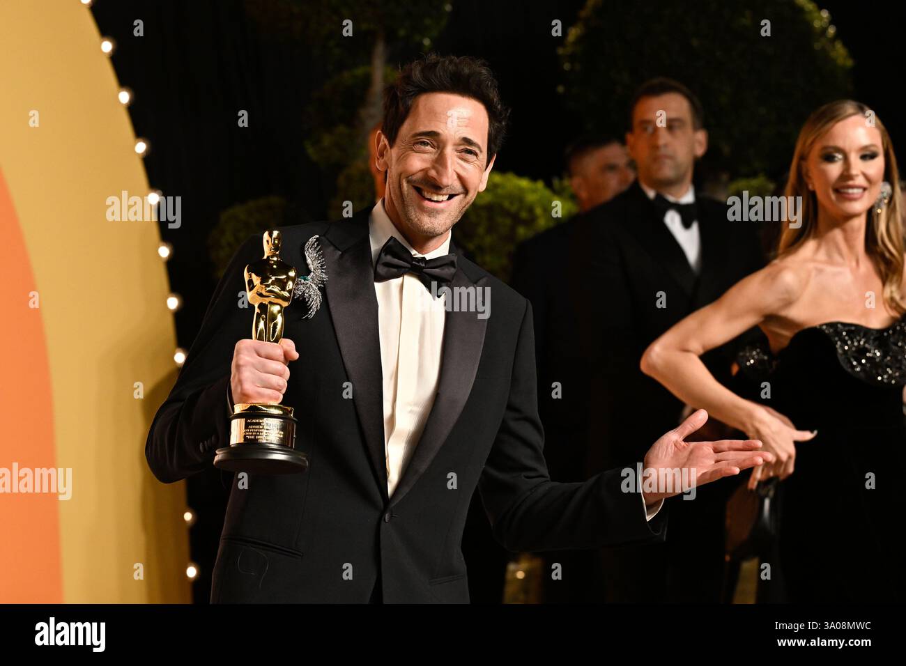 Adrien Brody arrives at the Vanity Fair Oscar Party on Sunday, March 2 ...