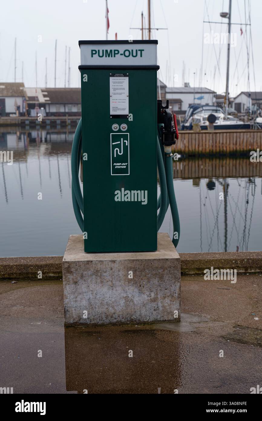 A marine pump-out station positioned at the waterfront marina, with ...