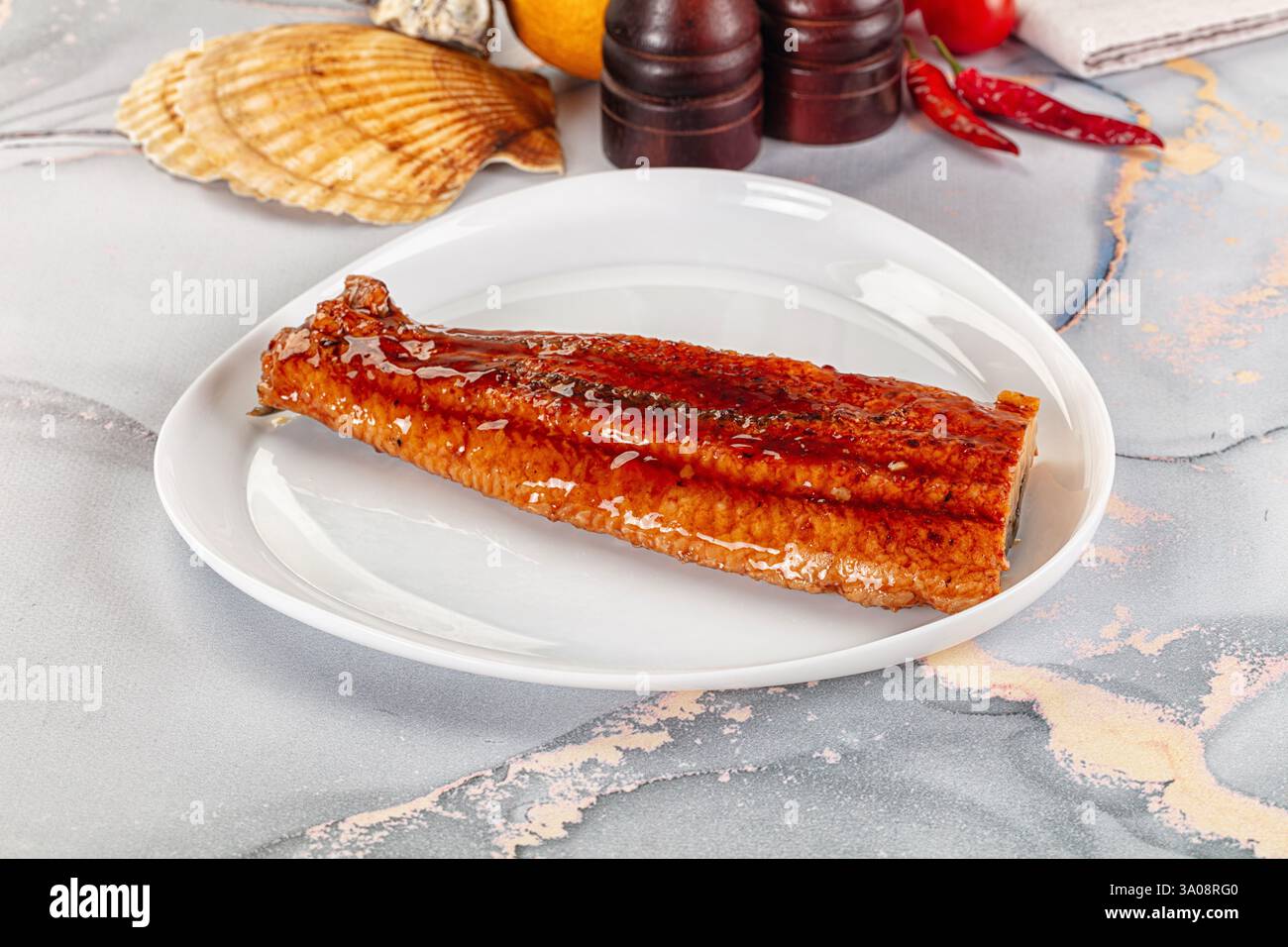 Smoked unagi eel fish in sause Stock Photo - Alamy