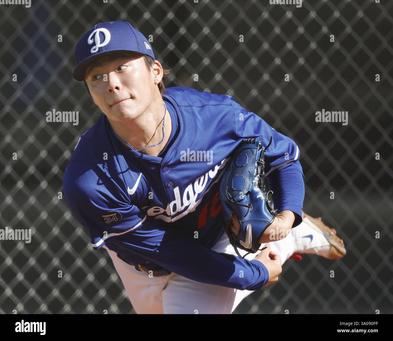 Los Angeles Dodgers pitcher Yoshinobu Yamamoto throws a bullpen session ...