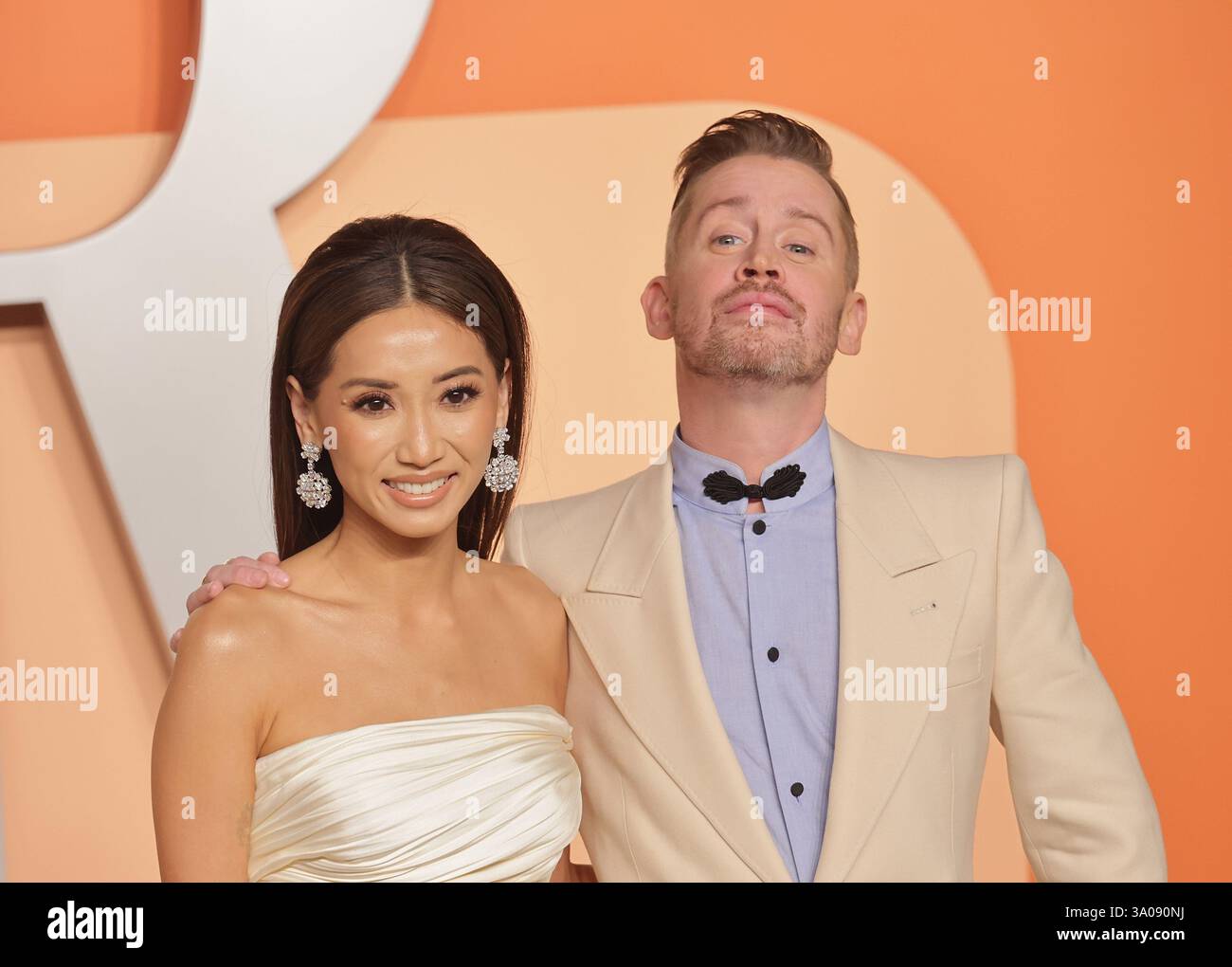 Macaulay Culkin, Brenda Song attend the 2025 Vanity Fair Oscar Party at ...