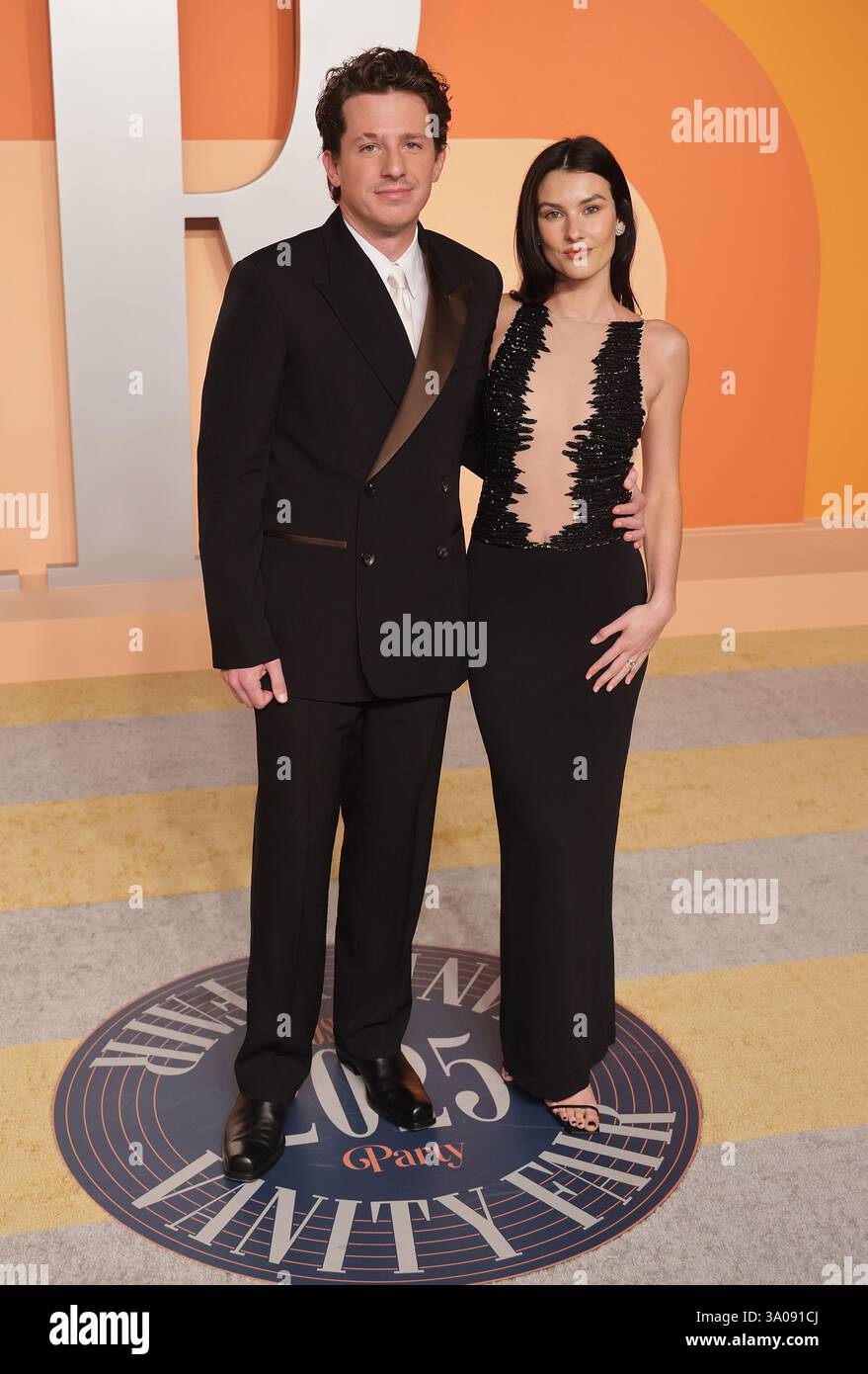Charlie Puth, Brooke Sansone attend the 2025 Vanity Fair Oscar Party at ...