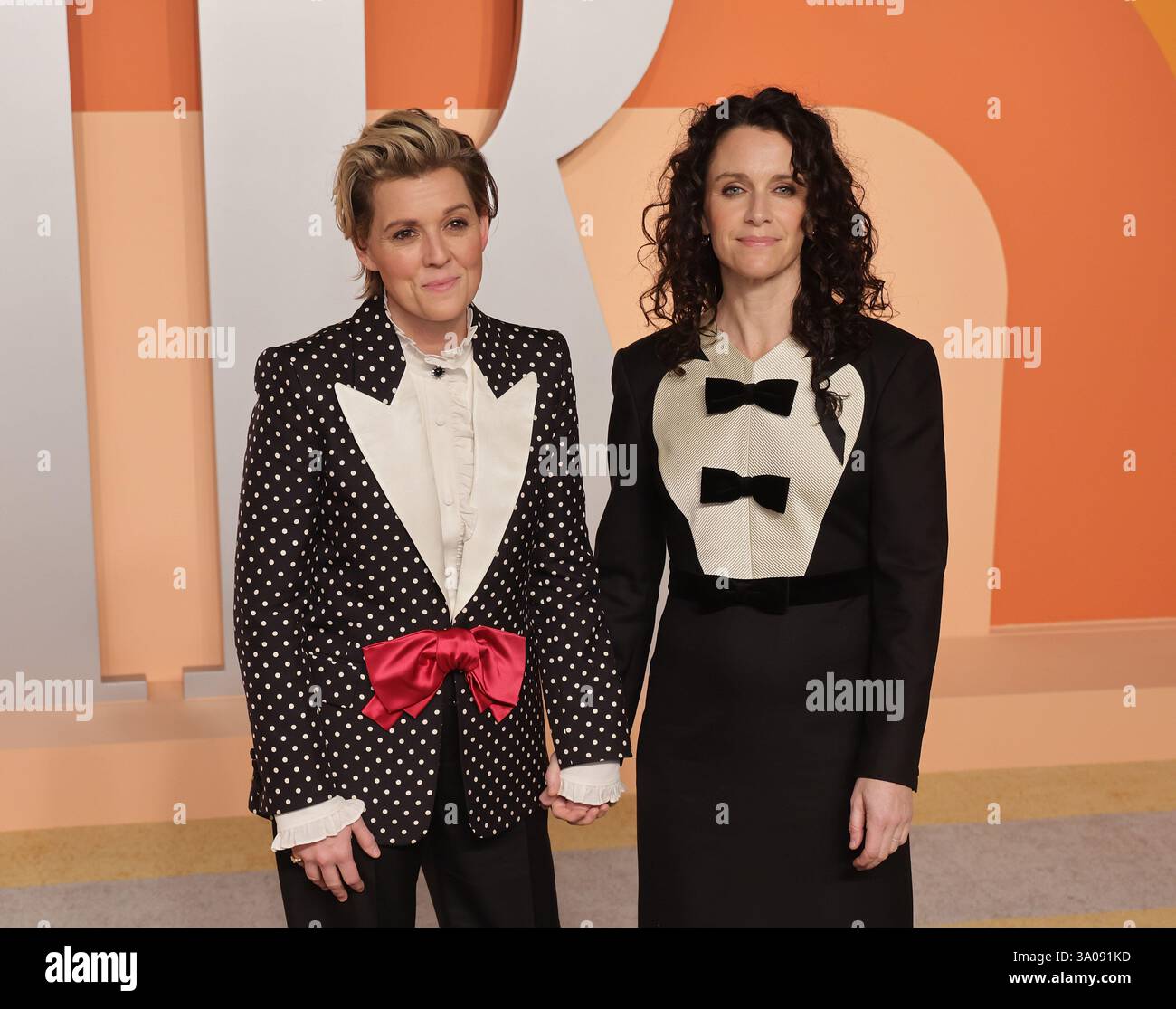 Brandi Carlile, Catherine Shepherd attends the 2025 Vanity Fair Oscar ...