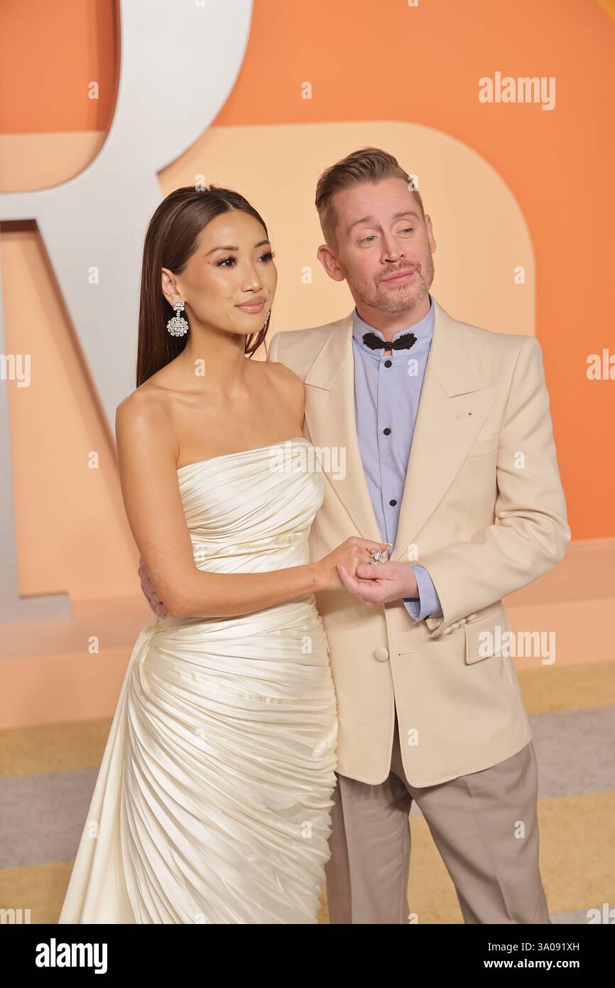Macaulay Culkin, Brenda Song attend the 2025 Vanity Fair Oscar Party at ...