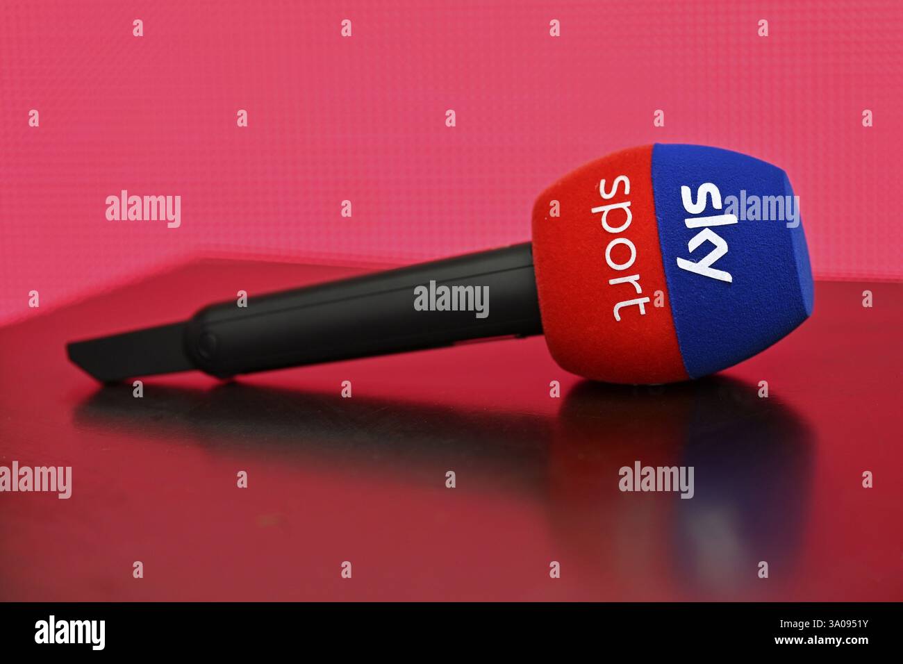 Close-up, microphone, mic, SKY, logo, red background, lying on table ...