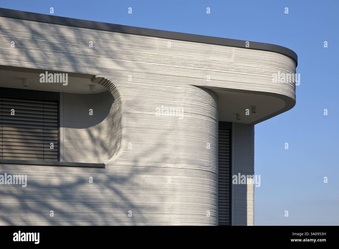 Detached house from the 3D printer with the typical grooves and round ...