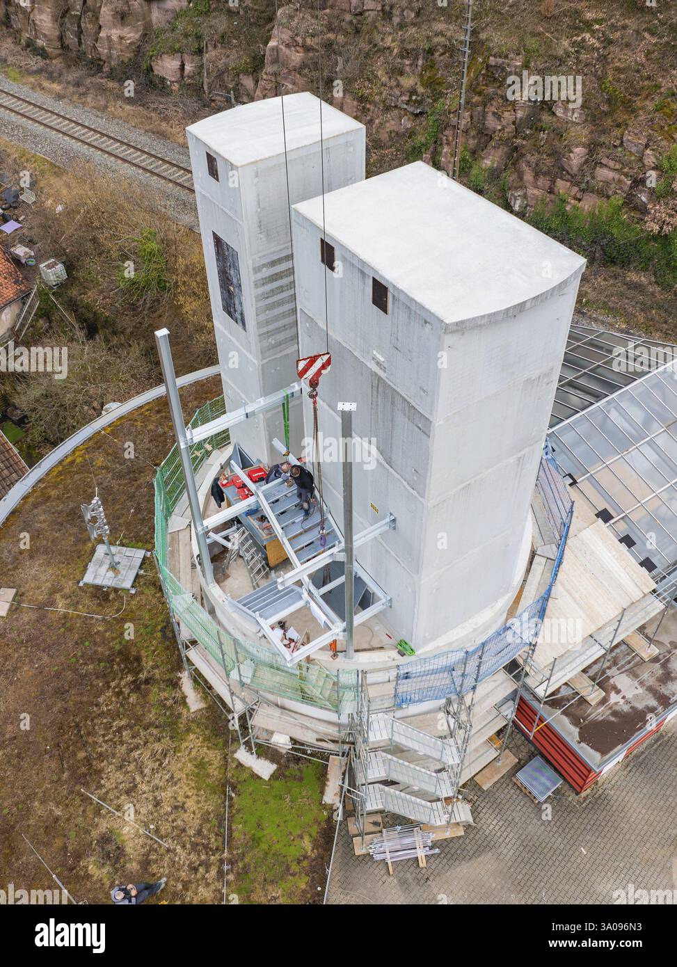 Construction of concrete towers with scaffolding on a building site ...