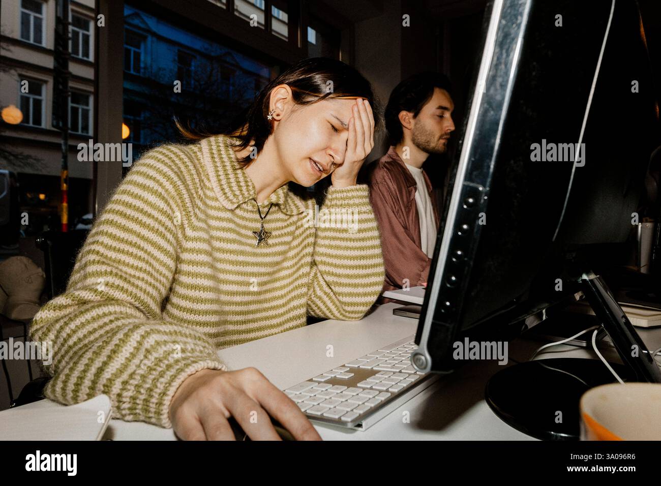 Sad entrepreneur sitting office desk hi-res stock photography and ...