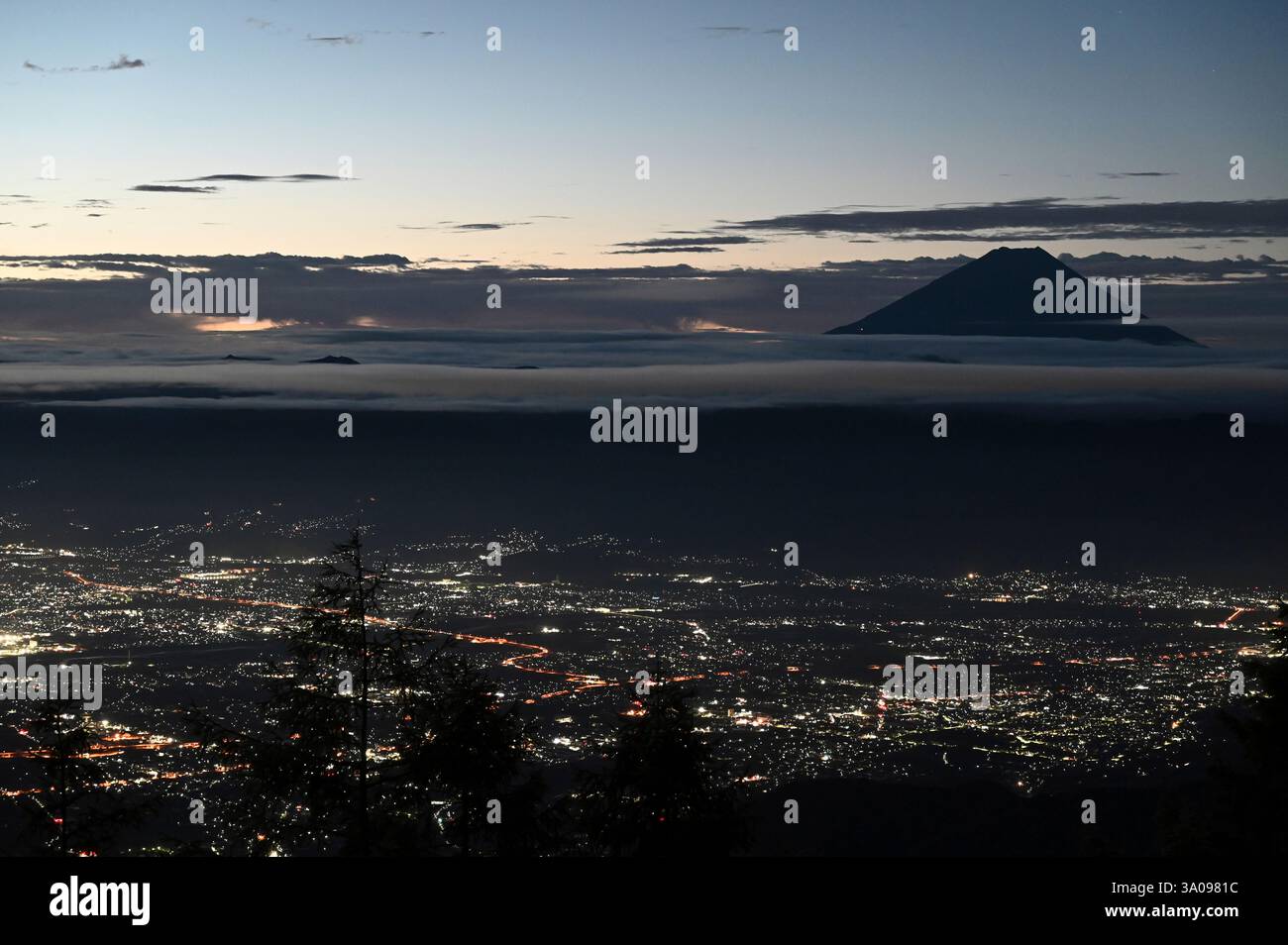 A picture take from Minami Alps City shows Kofu Basin in early morning ...