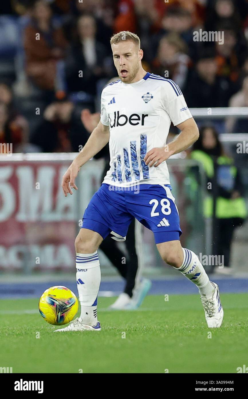 Comoâ??s Croatian defender Ivan Smolcic controls the ball during the ...
