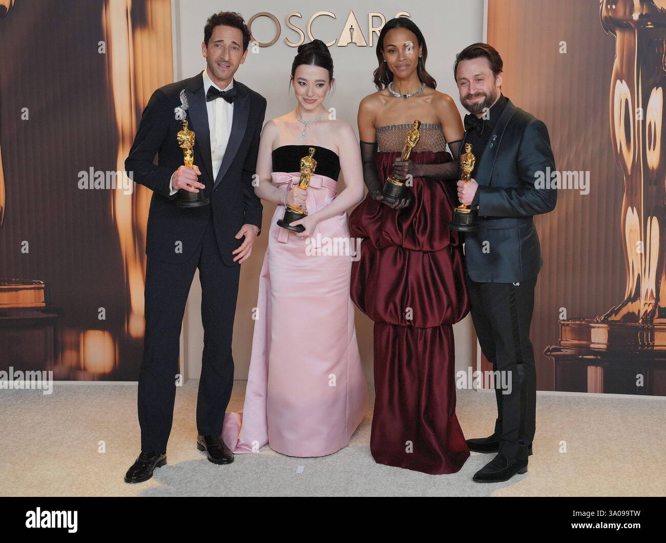 (L-R) Adrien Brody, winner of the Best Actor in a Leading Role for “The Brutalist”, Mikey ...