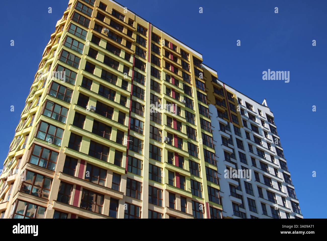 As I gaze upward at three magnificent tall buildings standing proudly ...
