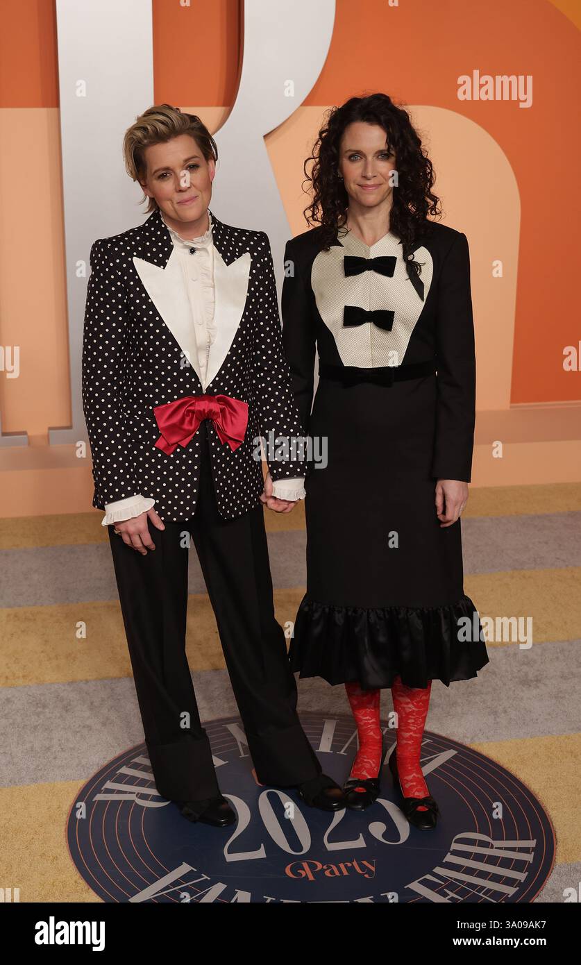 Brandi Carlile, Catherine Shepherd attends the 2025 Vanity Fair Oscar ...