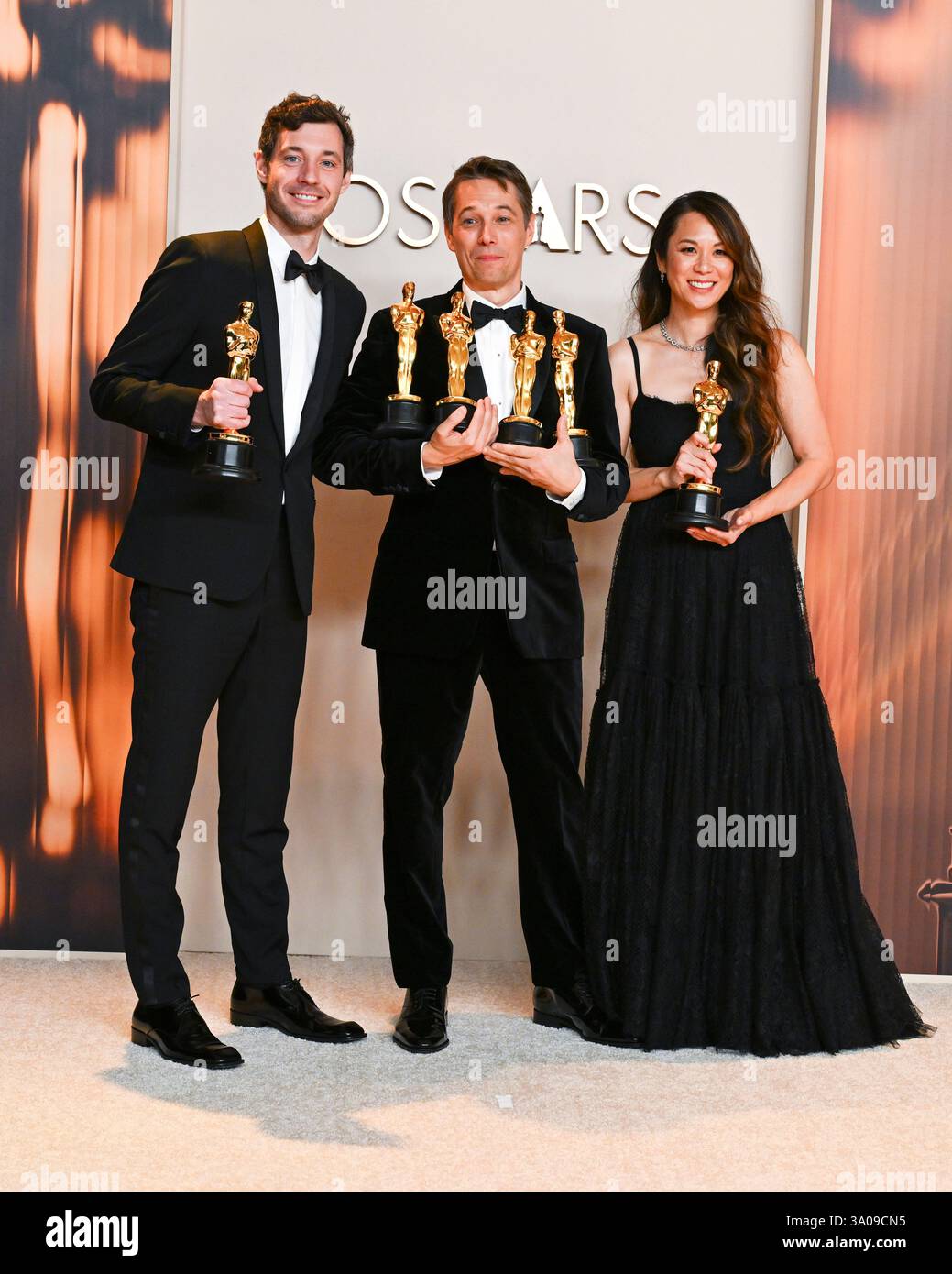 March 2, 2025, Los Angeles, California, USA: (L-R) Alex Coco, Sean Baker, and Samantha Quan ...