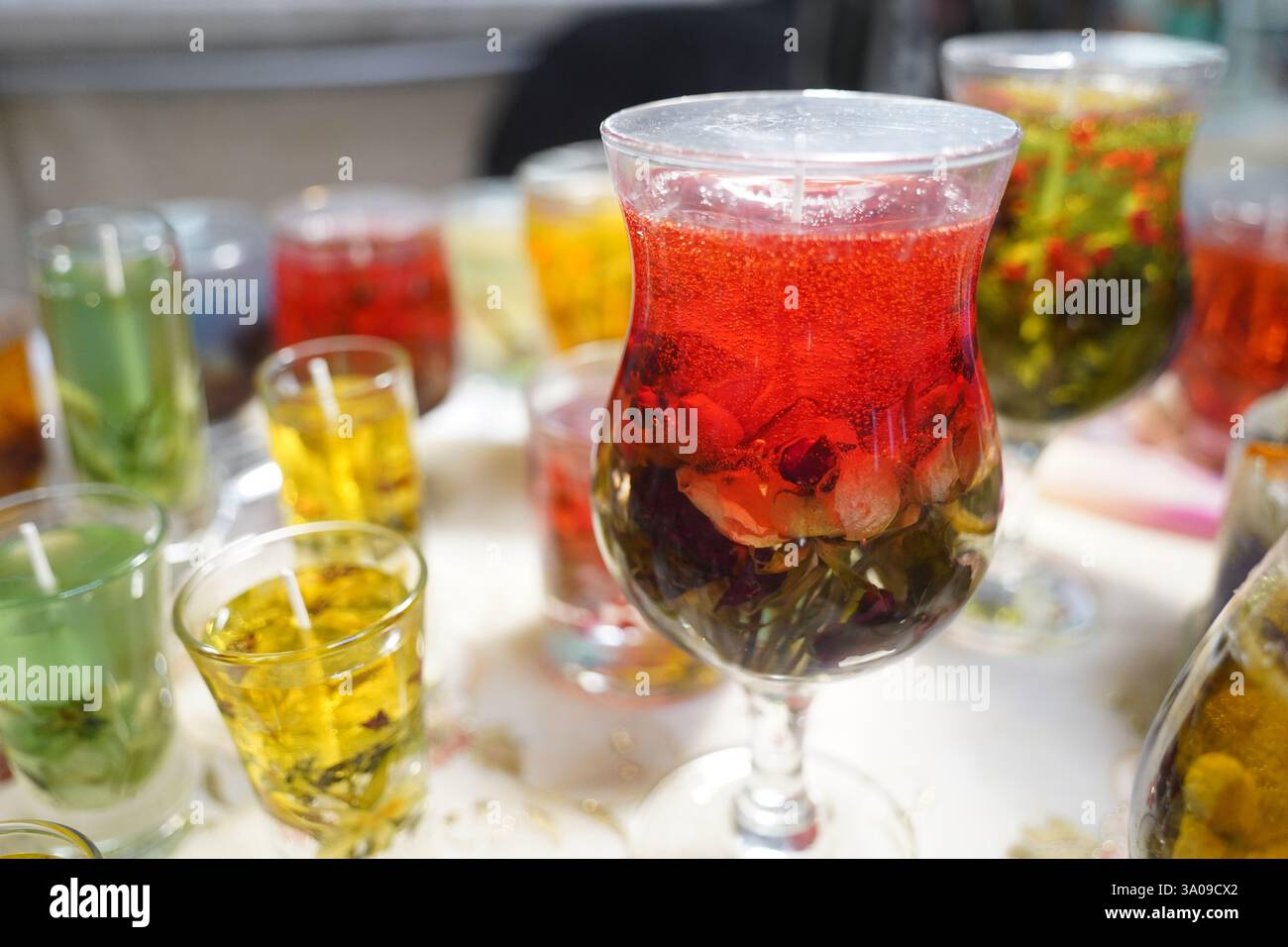 Gel candles in glass bowls. Craft fair Stock Photo - Alamy