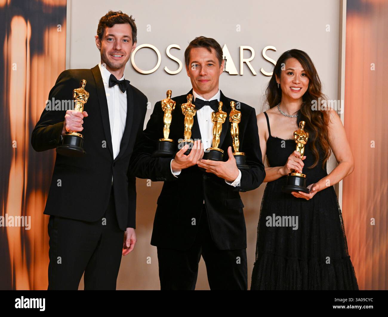 March 2, 2025, Los Angeles, California, USA: (L-R) Alex Coco, Sean Baker, and Samantha Quan ...