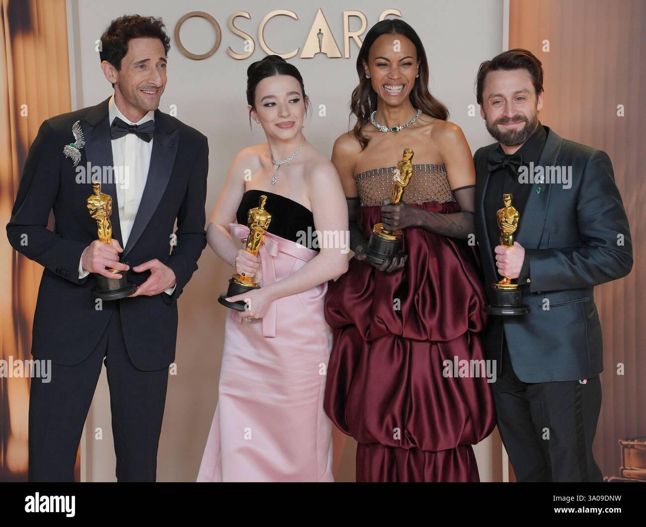 (L-R) Adrien Brody, winner of the Best Actor in a Leading Role for “The Brutalist”, Mikey ...