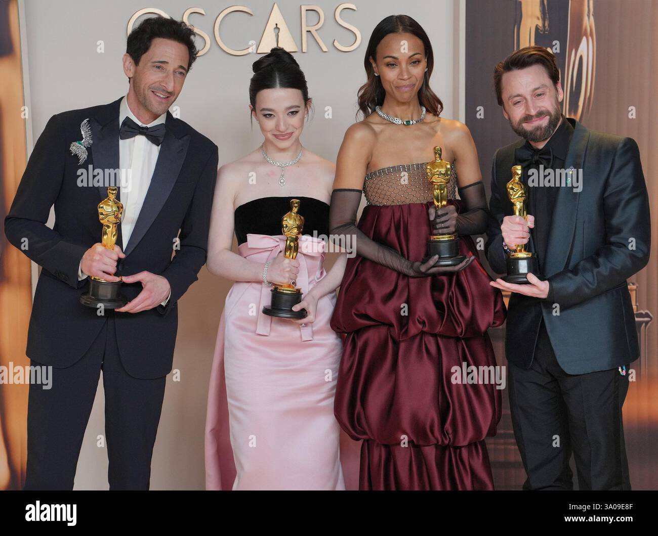(L-R) Adrien Brody, winner of the Best Actor in a Leading Role for “The Brutalist”, Mikey ...