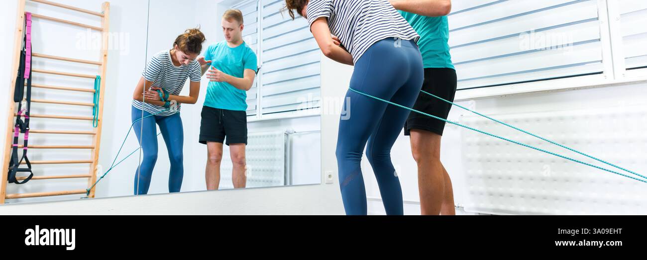 Woman with shoulder pain in physical therapy. Physical therapist ...