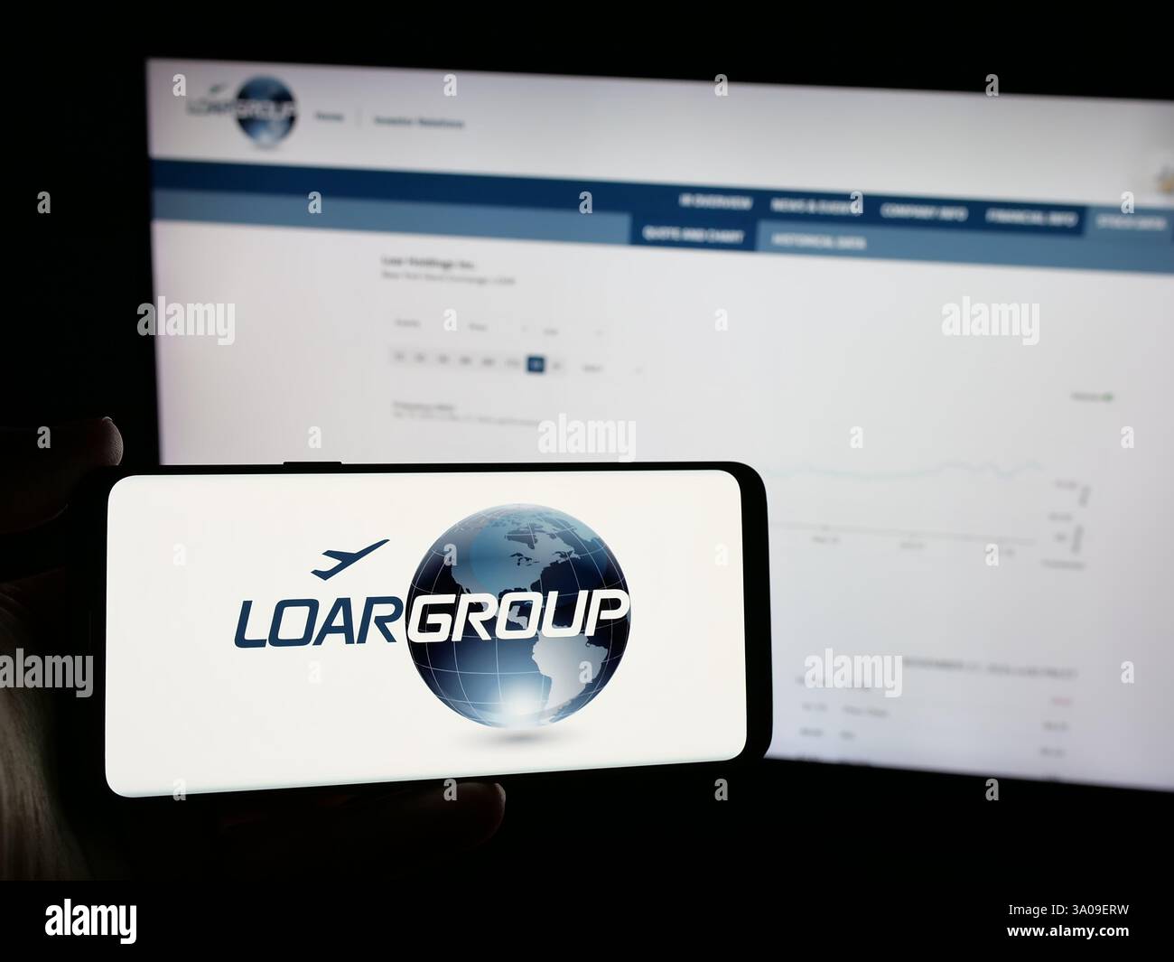 In this photo illustration, a person is holding a smartphone with the ...